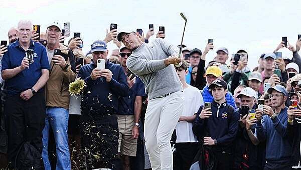 Home favourite Rory McIlroy rewards fans with strong start at Royal ...